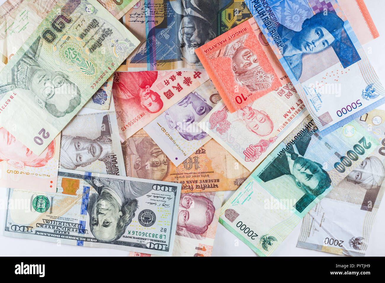 Multiple Currencies banknotes as colorful background showed the global ...