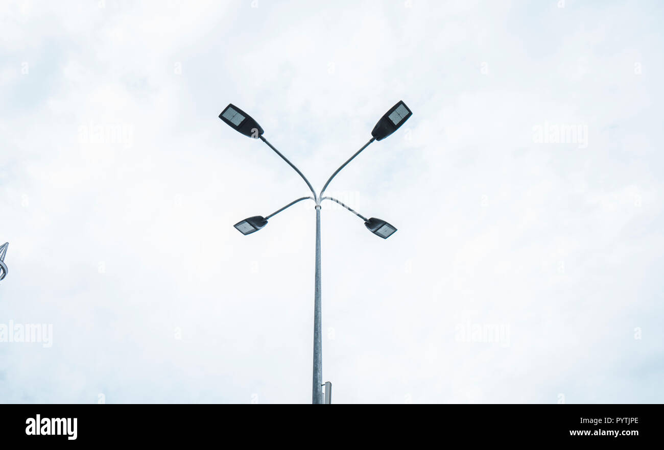 Street light in daytime and blue sky with clouds Stock Photo - Alamy