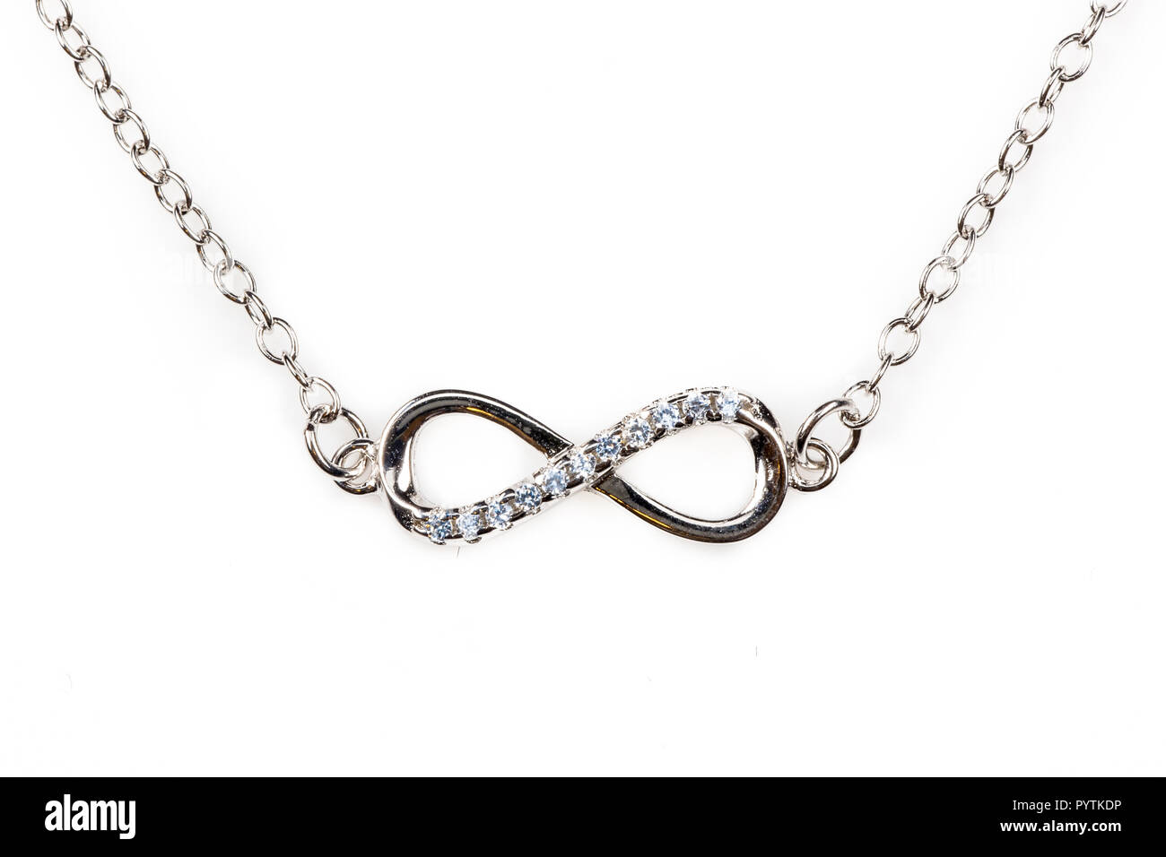 Silver infinity pendant with blue diamonds on a chain Stock Photo - Alamy