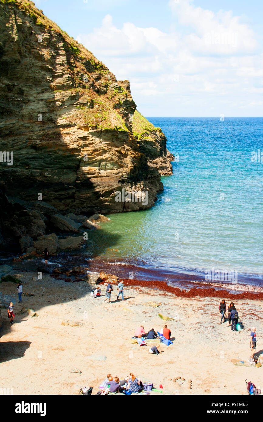 People enjoy the beach at Tintagel, Cornwall, England, UK Stock Photo ...