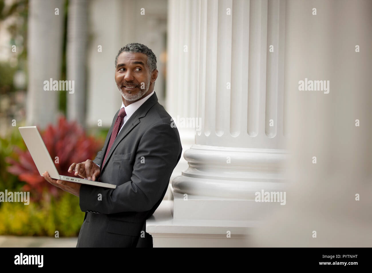 Businessman executives using computers hi-res stock photography and ...