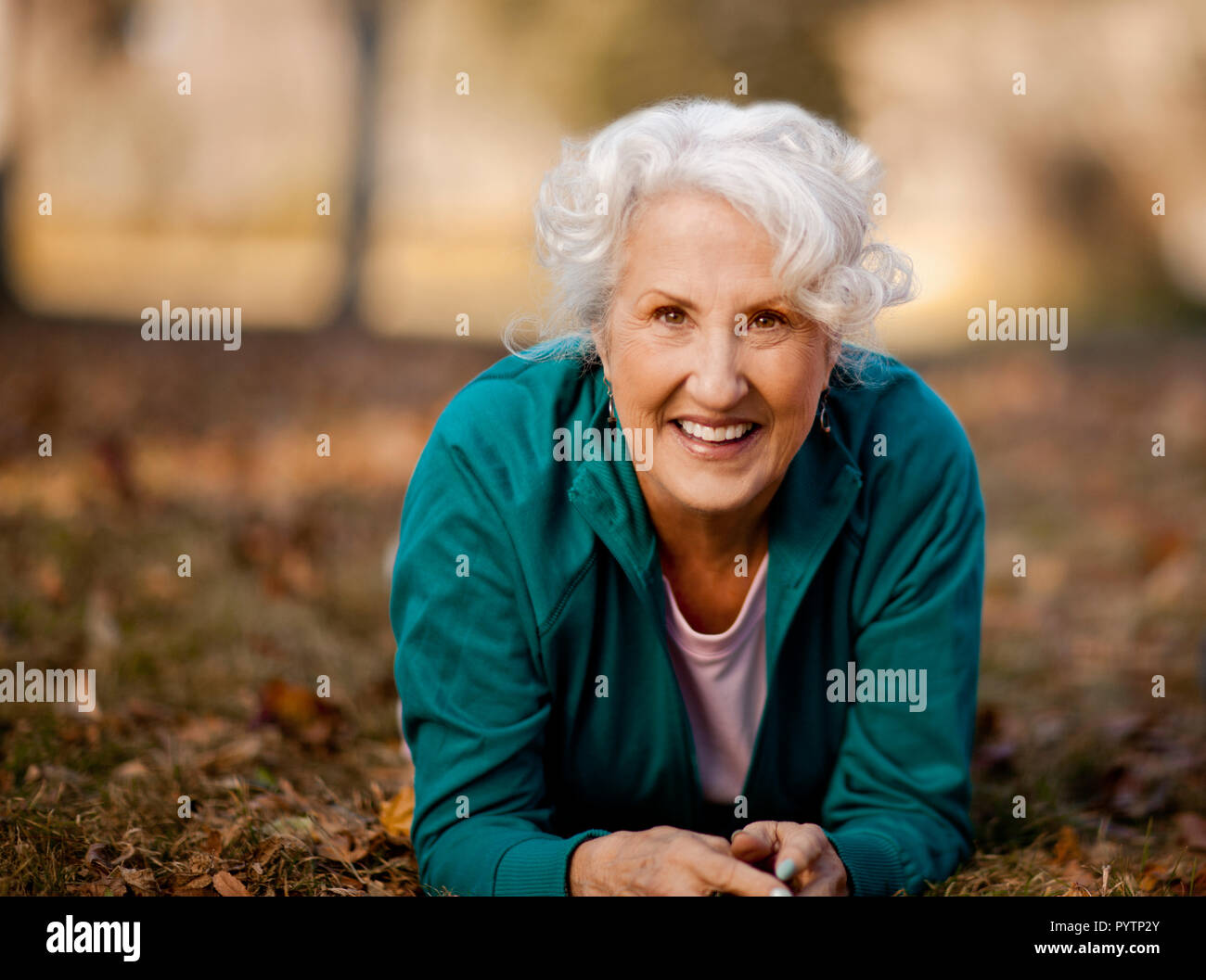 Portrait of a smiling senior woman Stock Photo - Alamy
