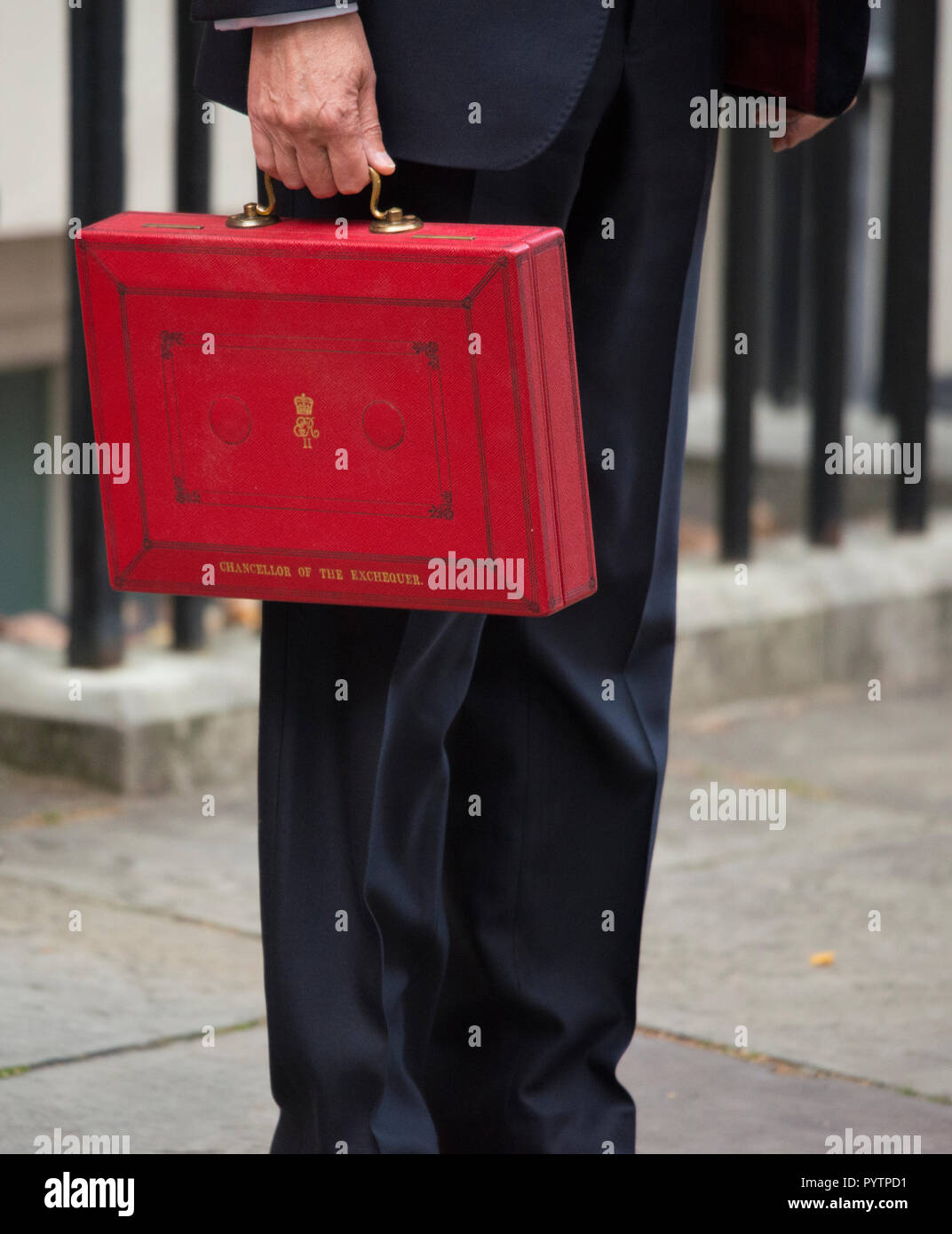 British Chancellor of the Exchequer Philip Hammond shows the ...