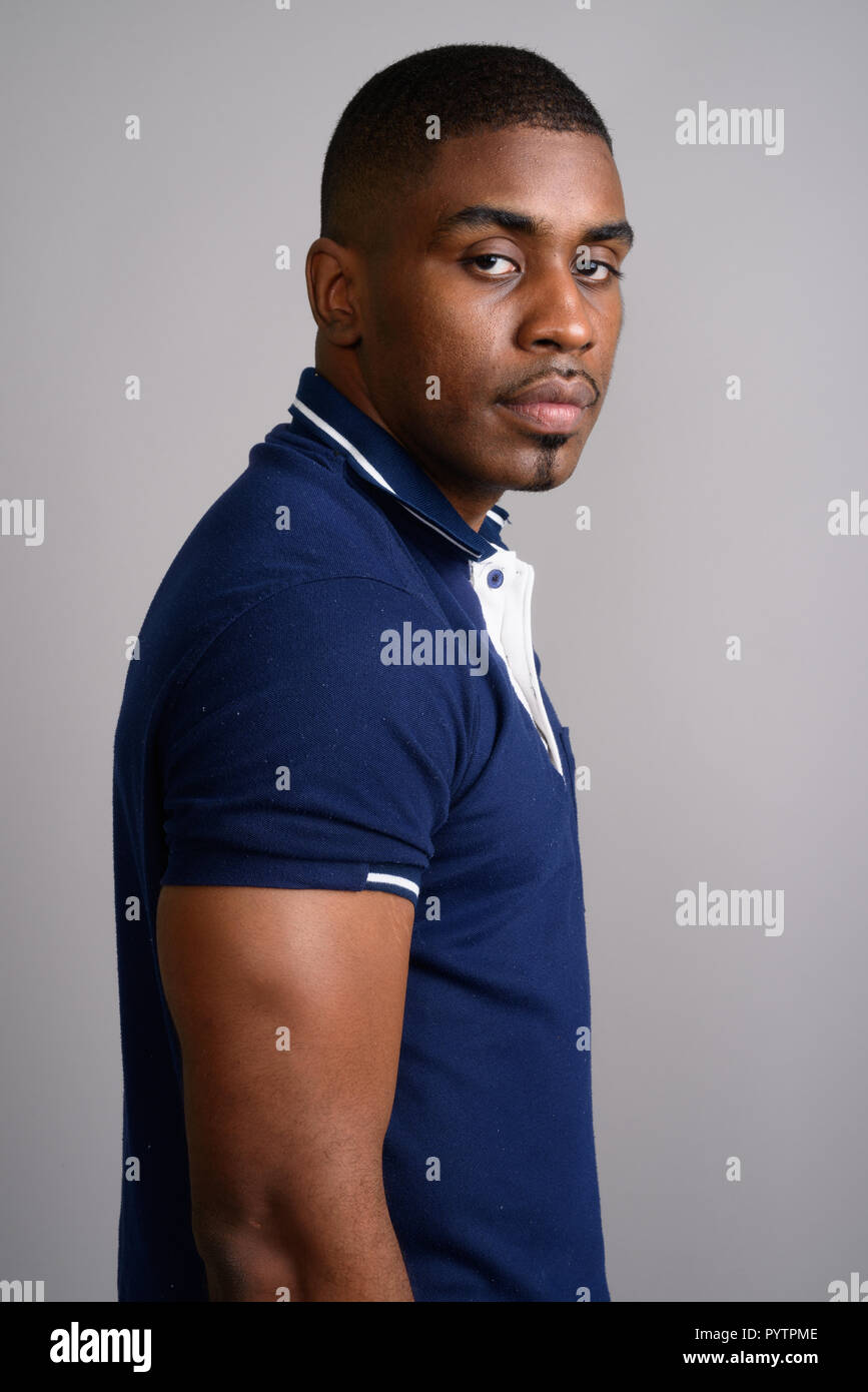 Blue polo shirt hi-res stock photography and images - Alamy