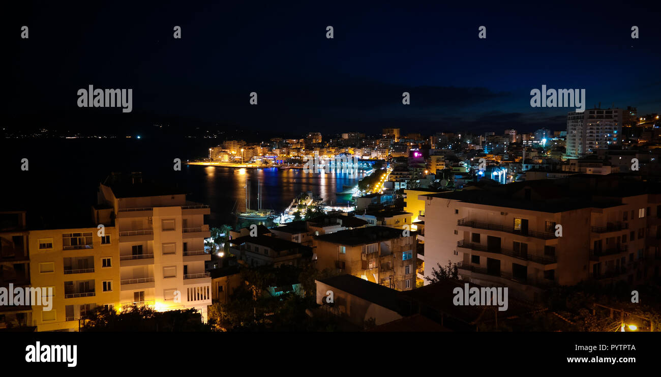 night Aerial Panoramic view to Saranda city and bay of Ionian sea in ...