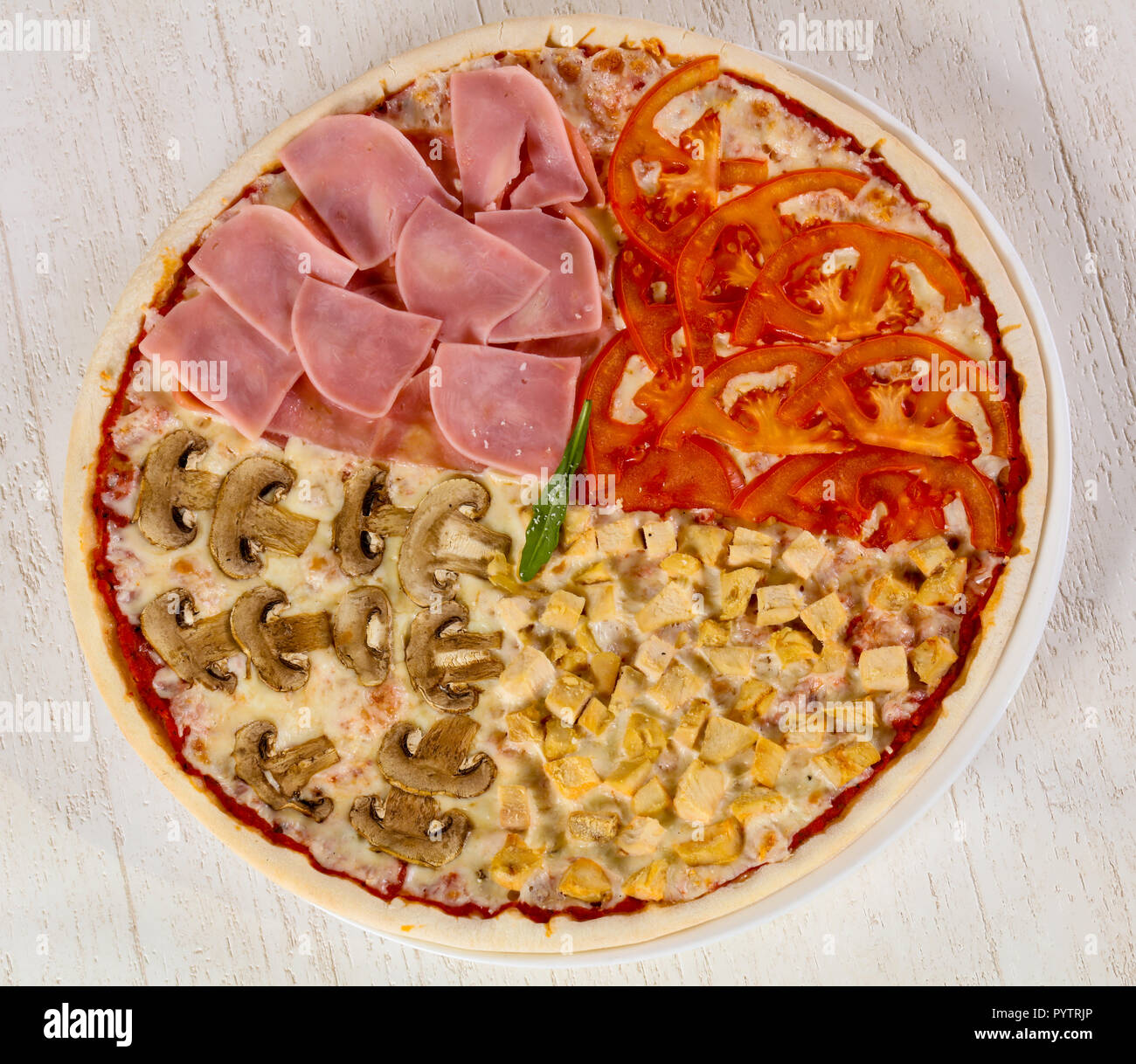 Pizza assortment mix with ham and mushrooms Stock Photo - Alamy