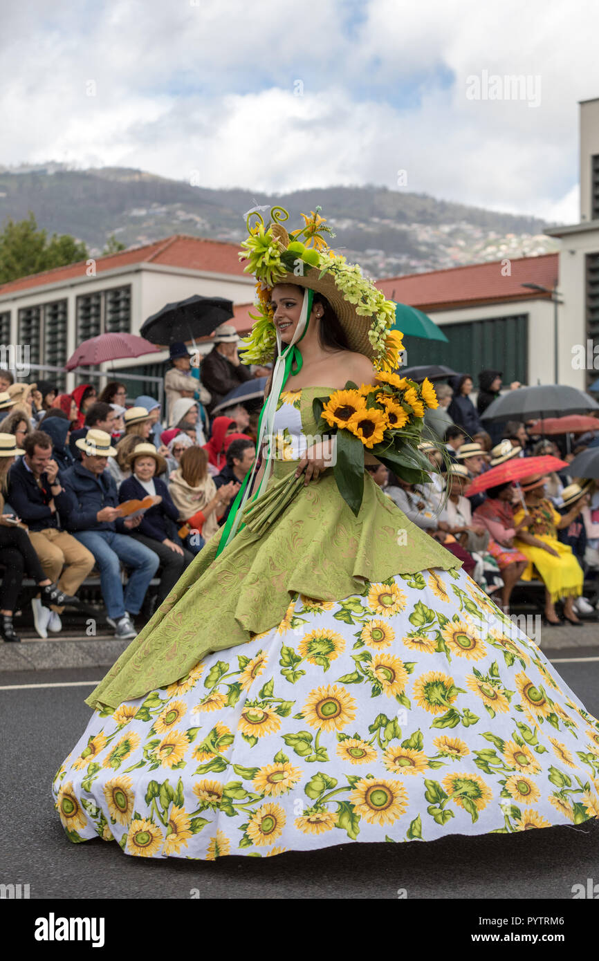 Funchal; Madeira; Portugal - April 22; 2018: Woman in colorful dress ...