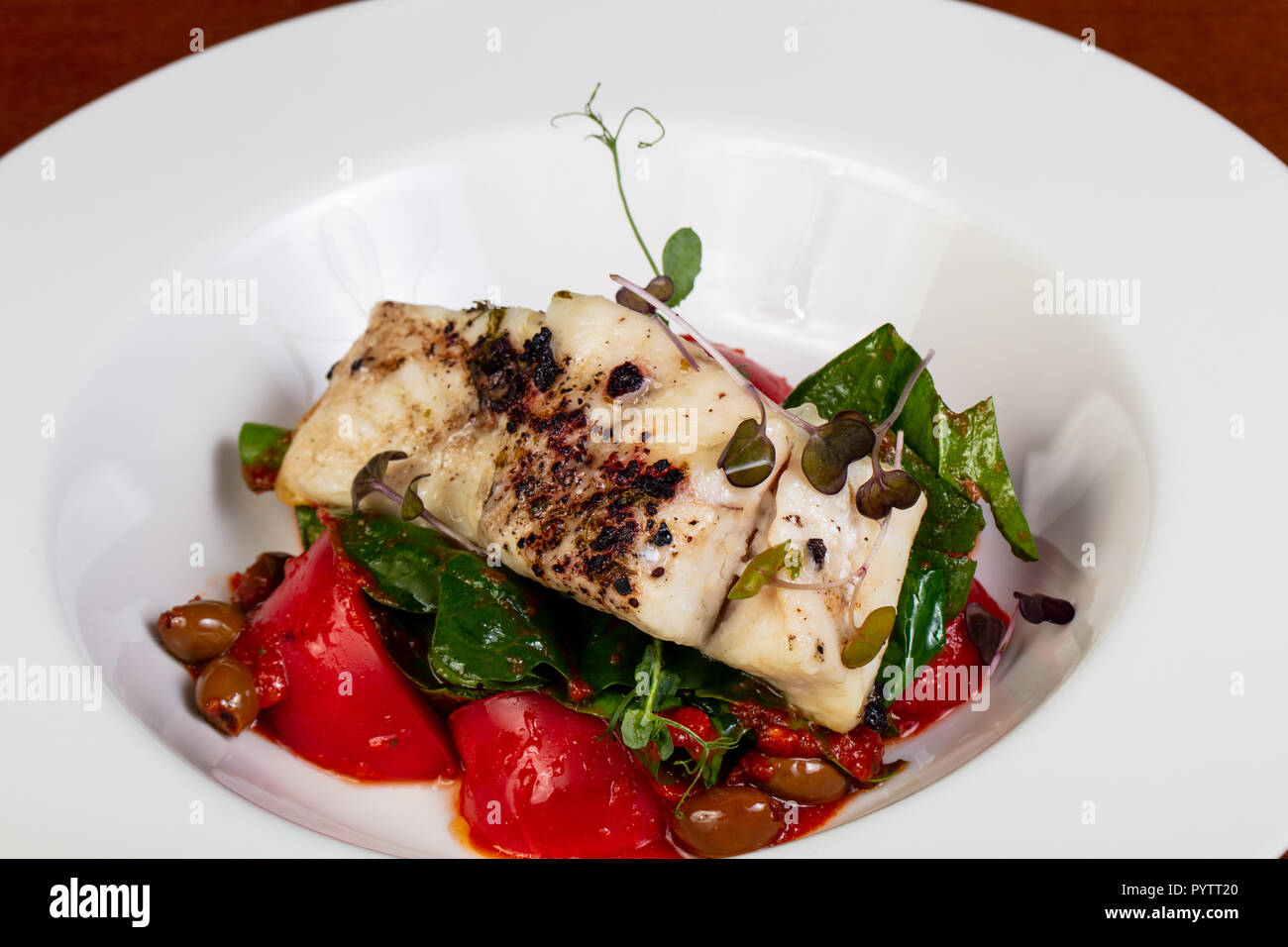 Pike Perch fillet with tomato Stock Photo - Alamy