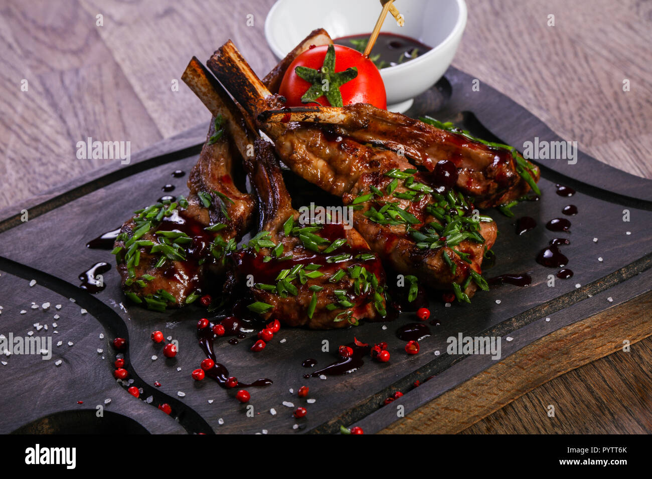 Roasted lamb ribs with sauce Stock Photo - Alamy