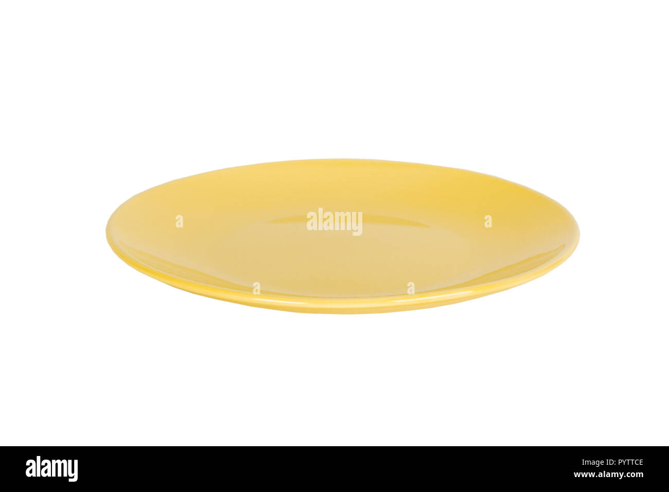 A yellow plate isolated on the white background. perspective view Stock ...