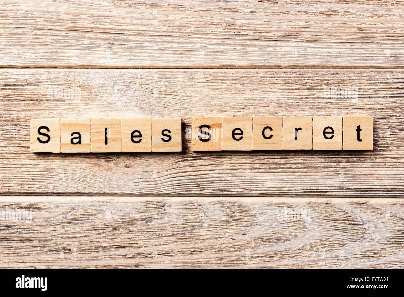 sale secret word written on wood block. sale secret text on table ...
