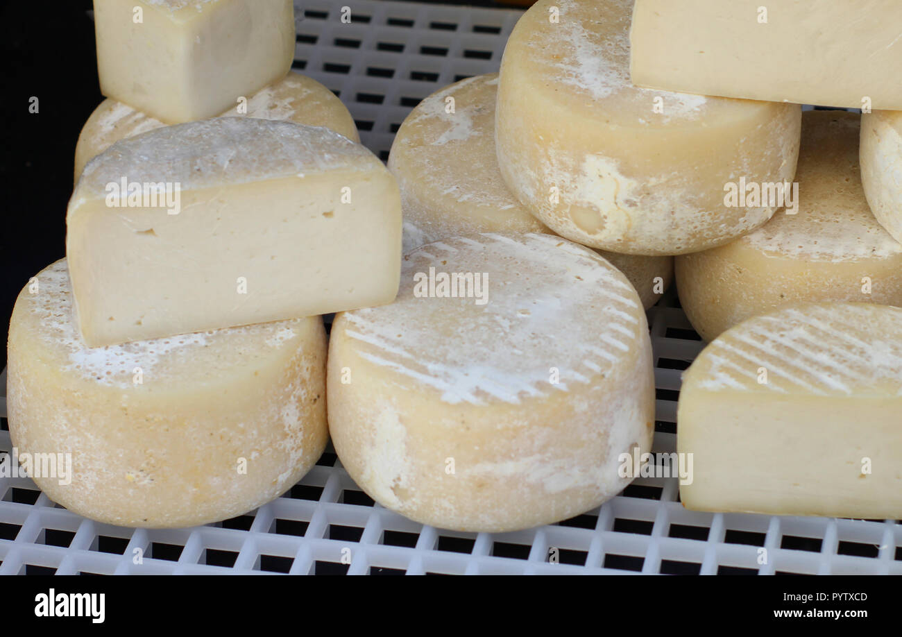 some forms of white cheese at the market Stock Photo - Alamy