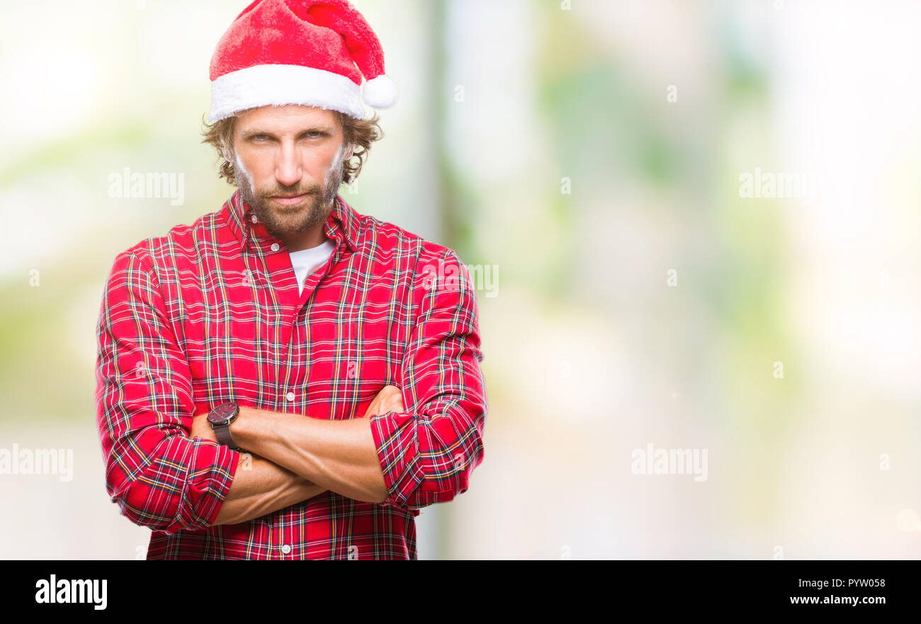 Handsome hispanic man model wearing santa claus christmas over isolated ...