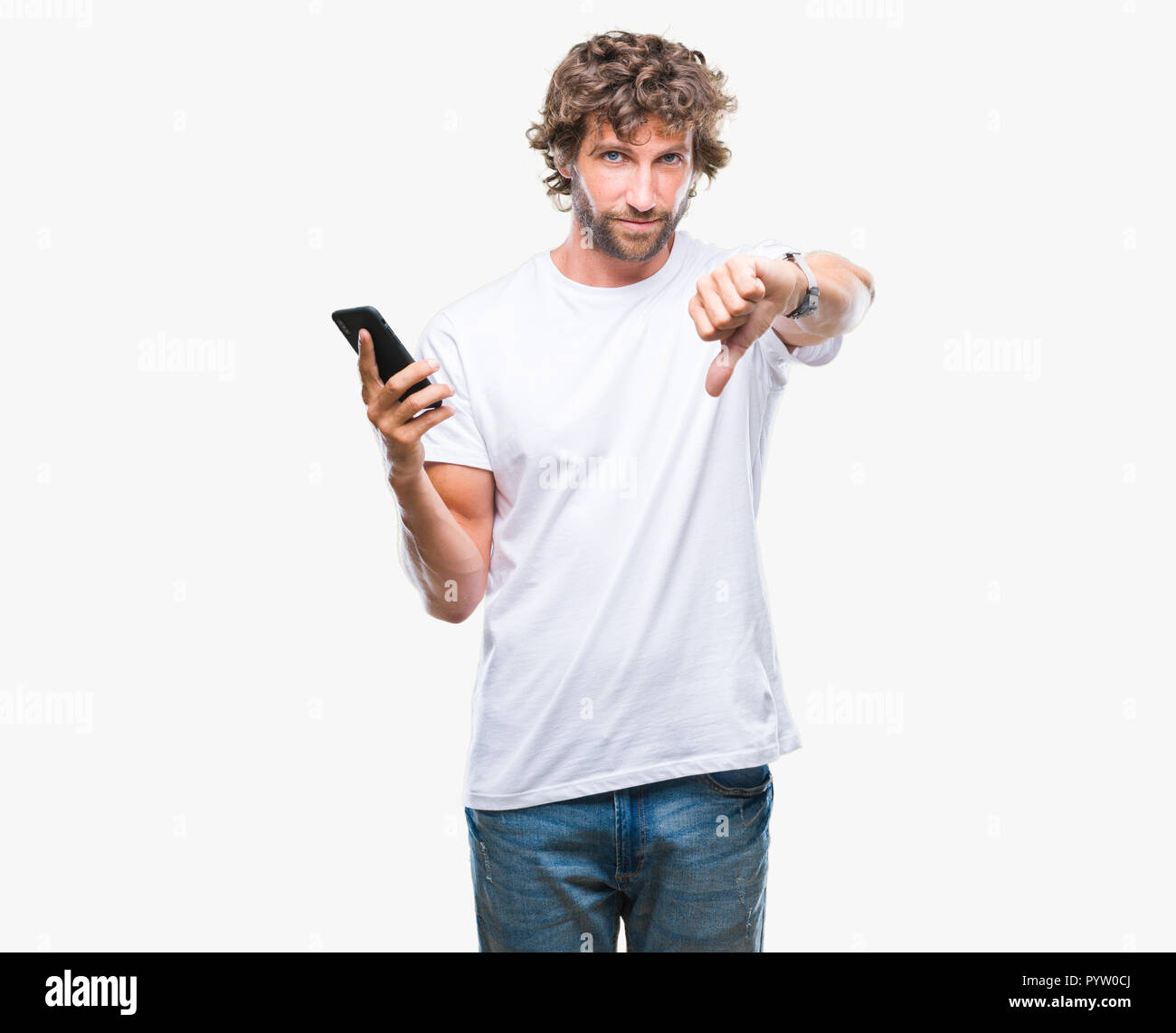 Handsome hispanic man model sending message texting using smartphone ...