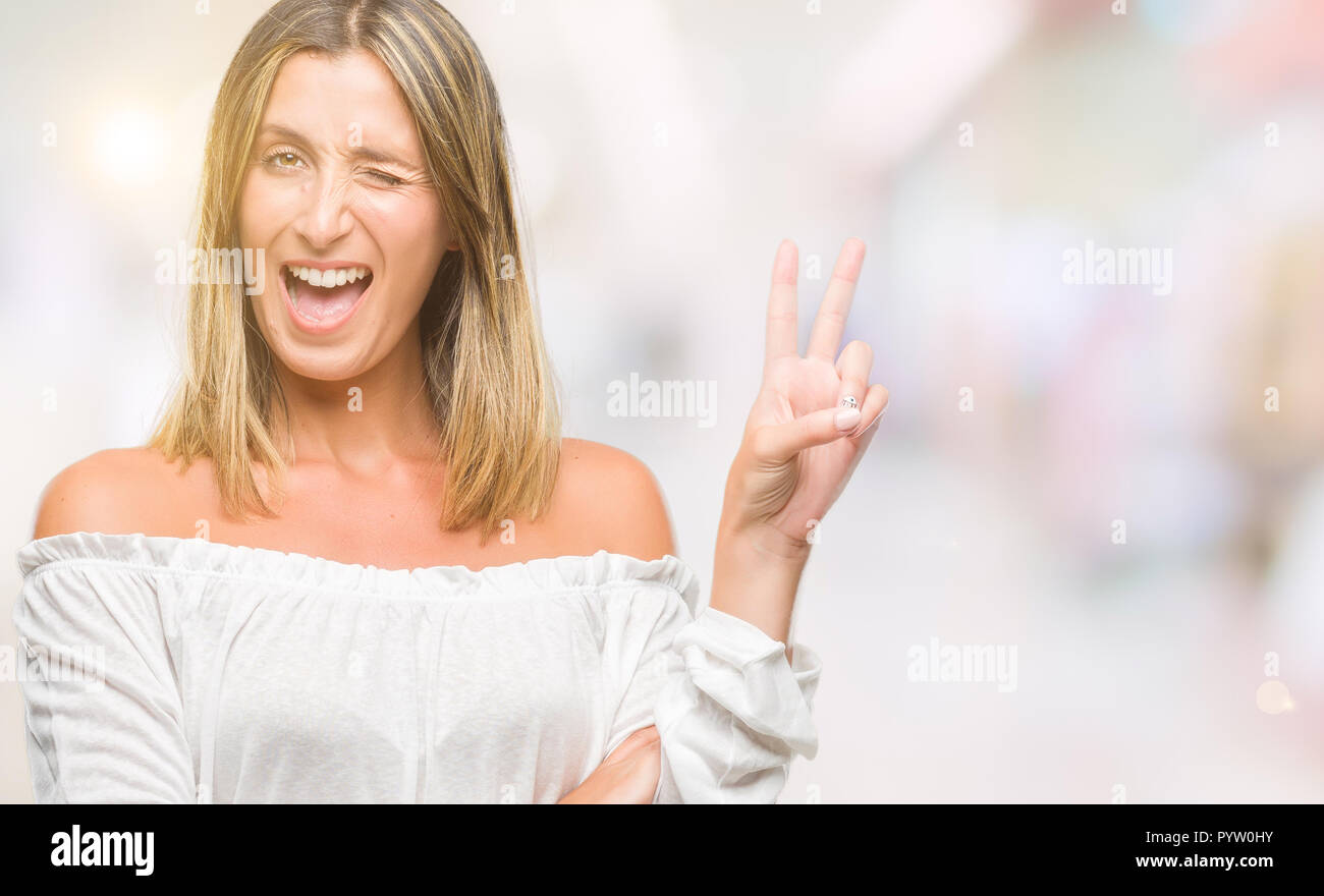 Hispanic beautiful woman winking face hi-res stock photography and ...