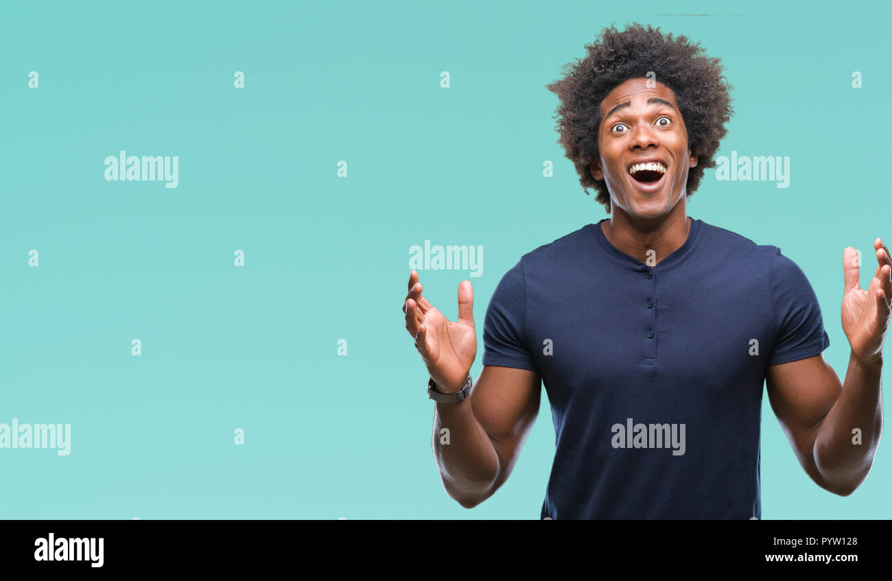 Afro american man over isolated background celebrating mad and crazy ...