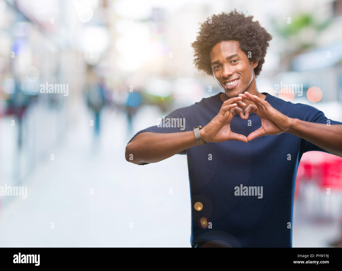 Afro american man over isolated background smiling in love showing ...