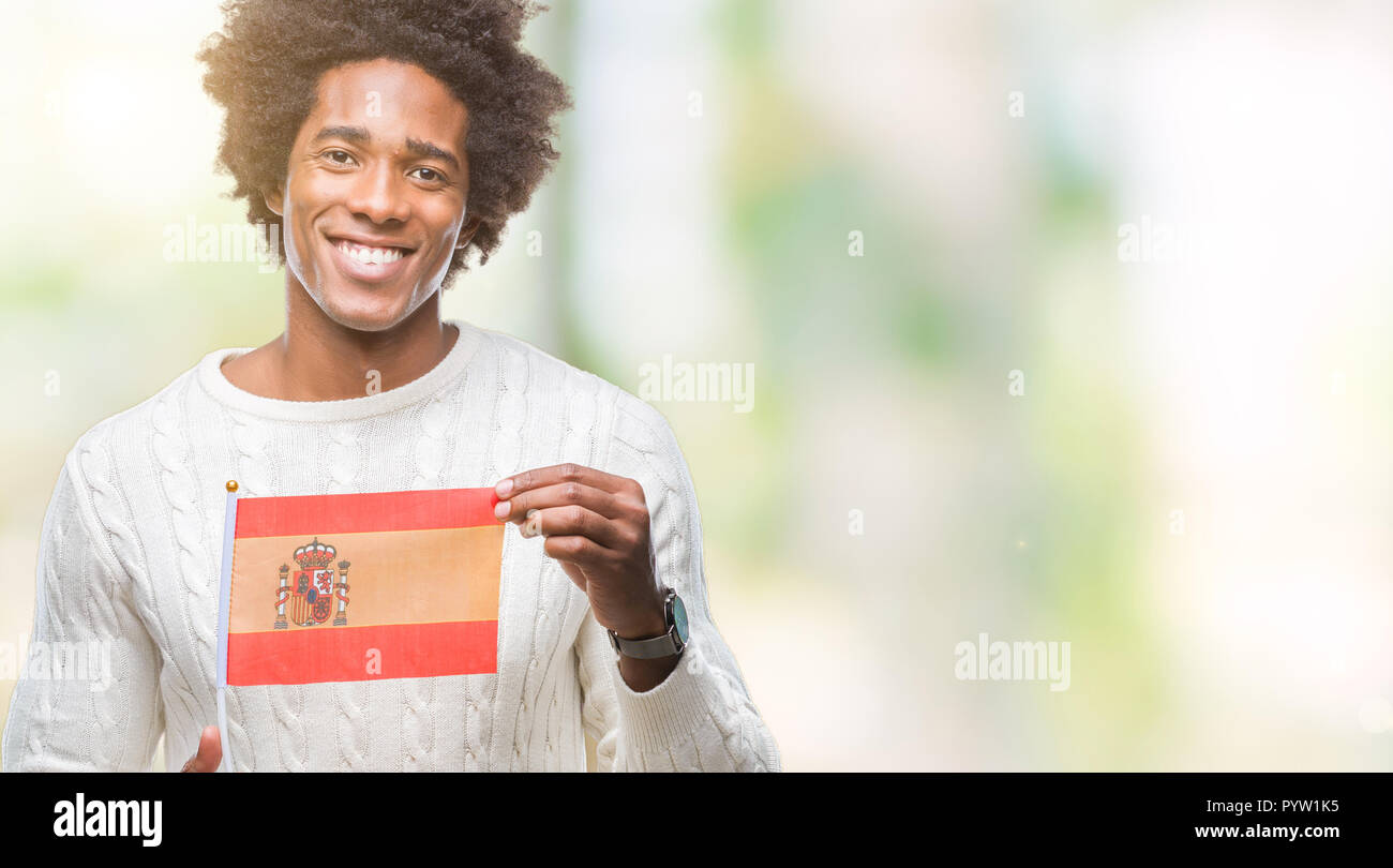 Afro american man flag of Spain over isolated background with a happy ...