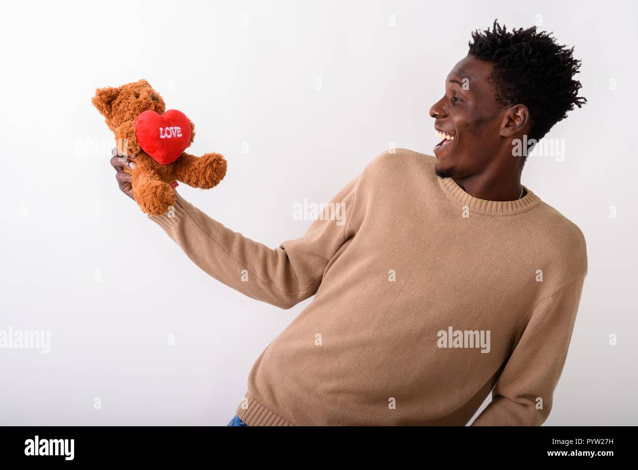 Profile view of young happy black African man smiling while look Stock ...