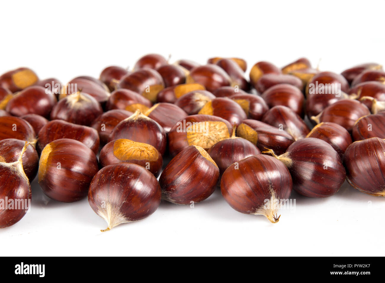 Fresh chestnuts with peeled roasted chestnut isolated on white ...