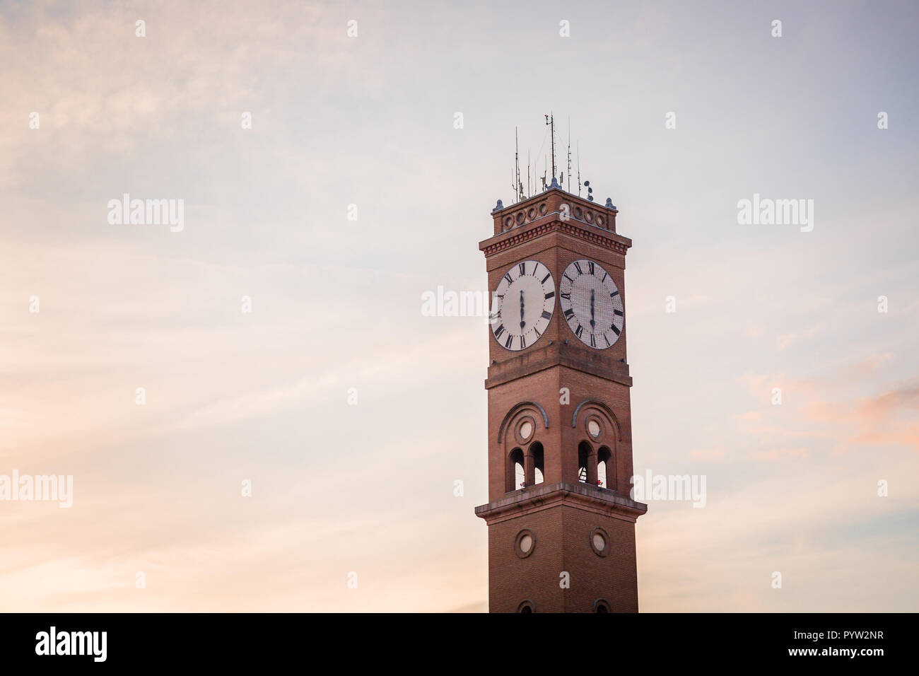 ancient clock tower on sky background Stock Photo - Alamy
