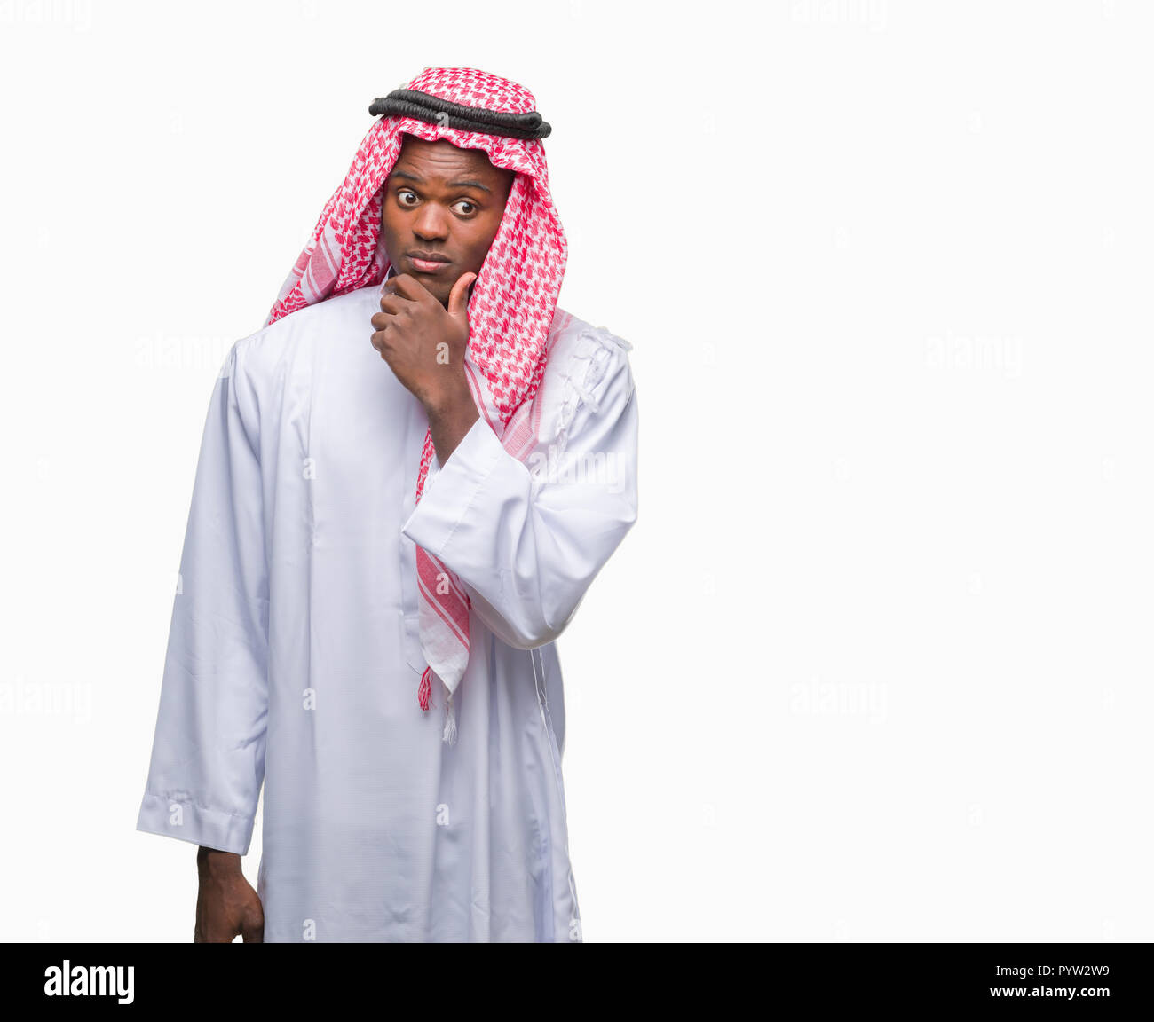 Young arabic african man wearing traditional keffiyeh over isolated ...