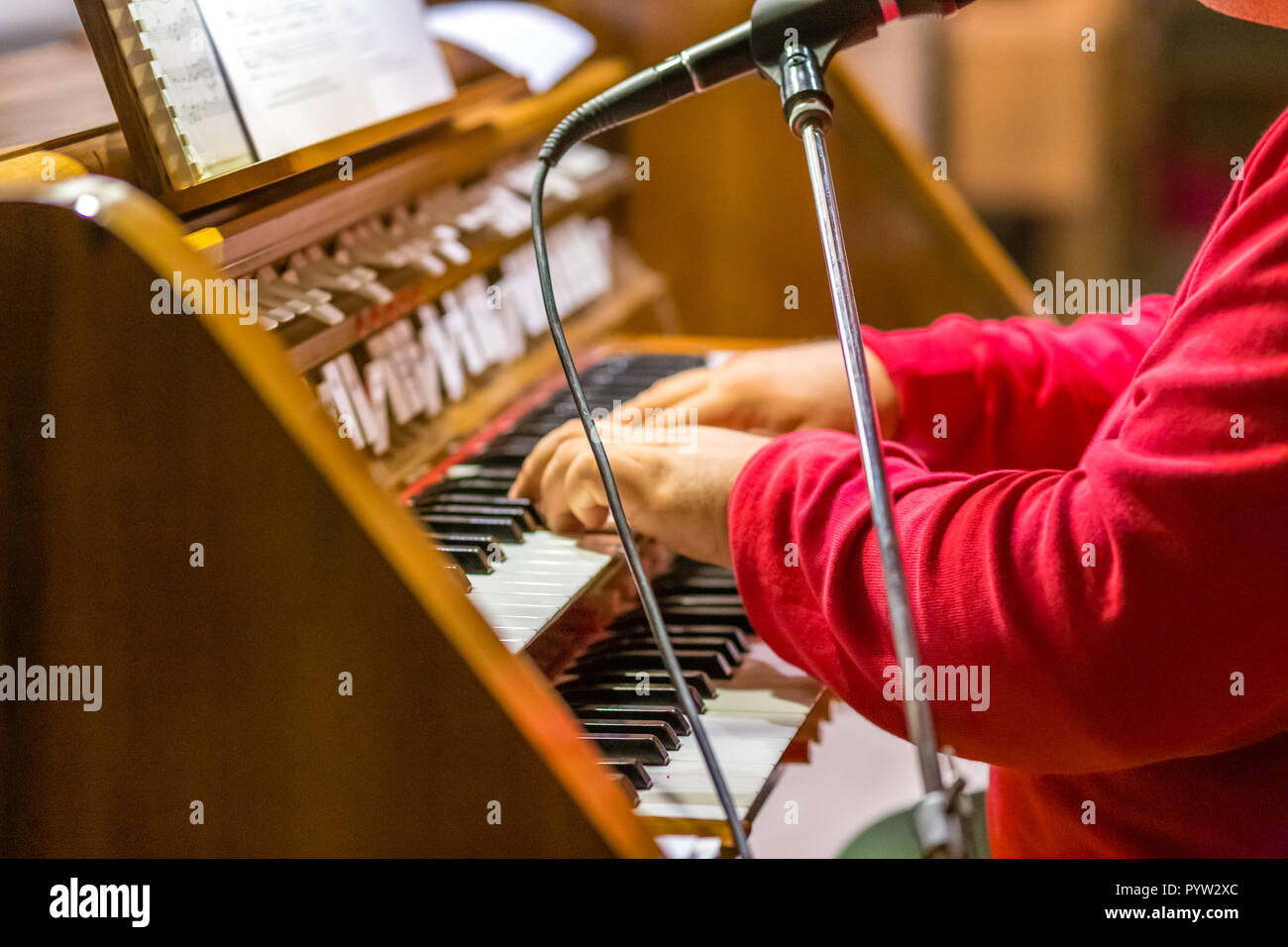male hands playing organ keyboard in church Stock Photo - Alamy