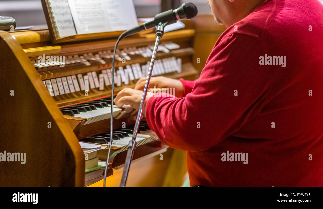 male hands playing organ keyboard in church Stock Photo - Alamy