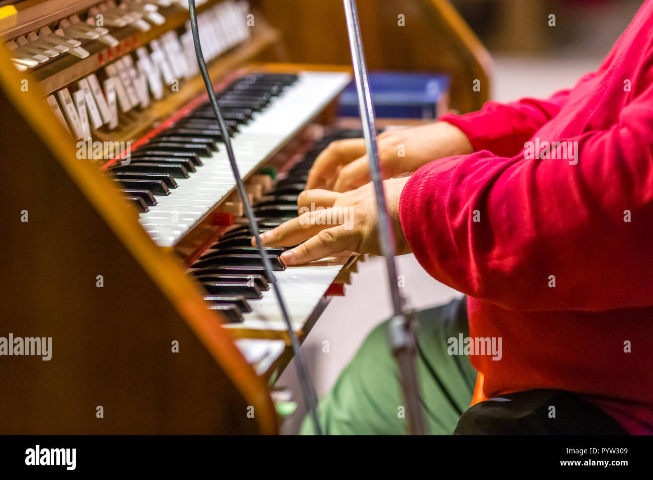 male hands playing organ keyboard in church Stock Photo - Alamy