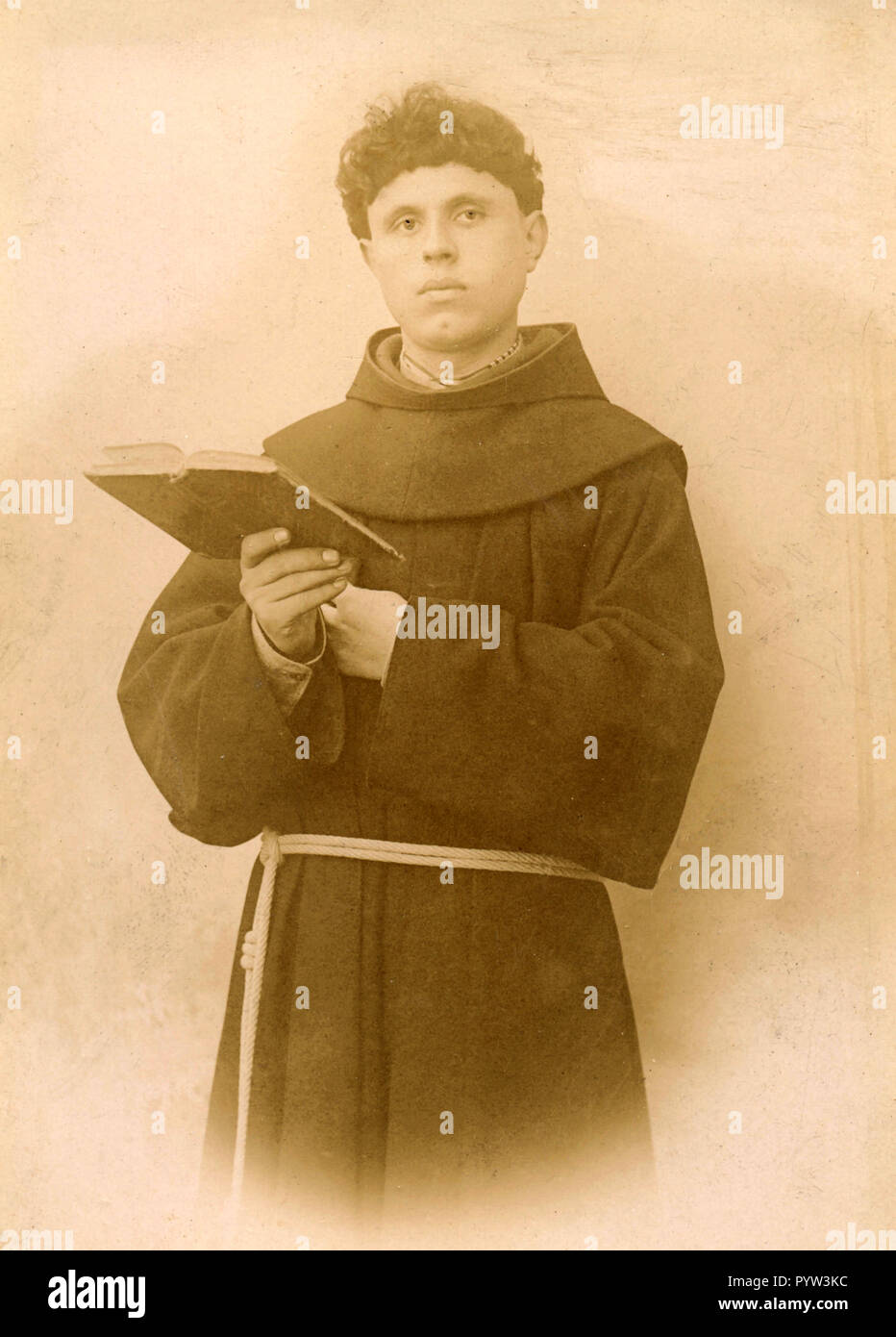 Young friar with the bible, Italy 1880s Stock Photo - Alamy
