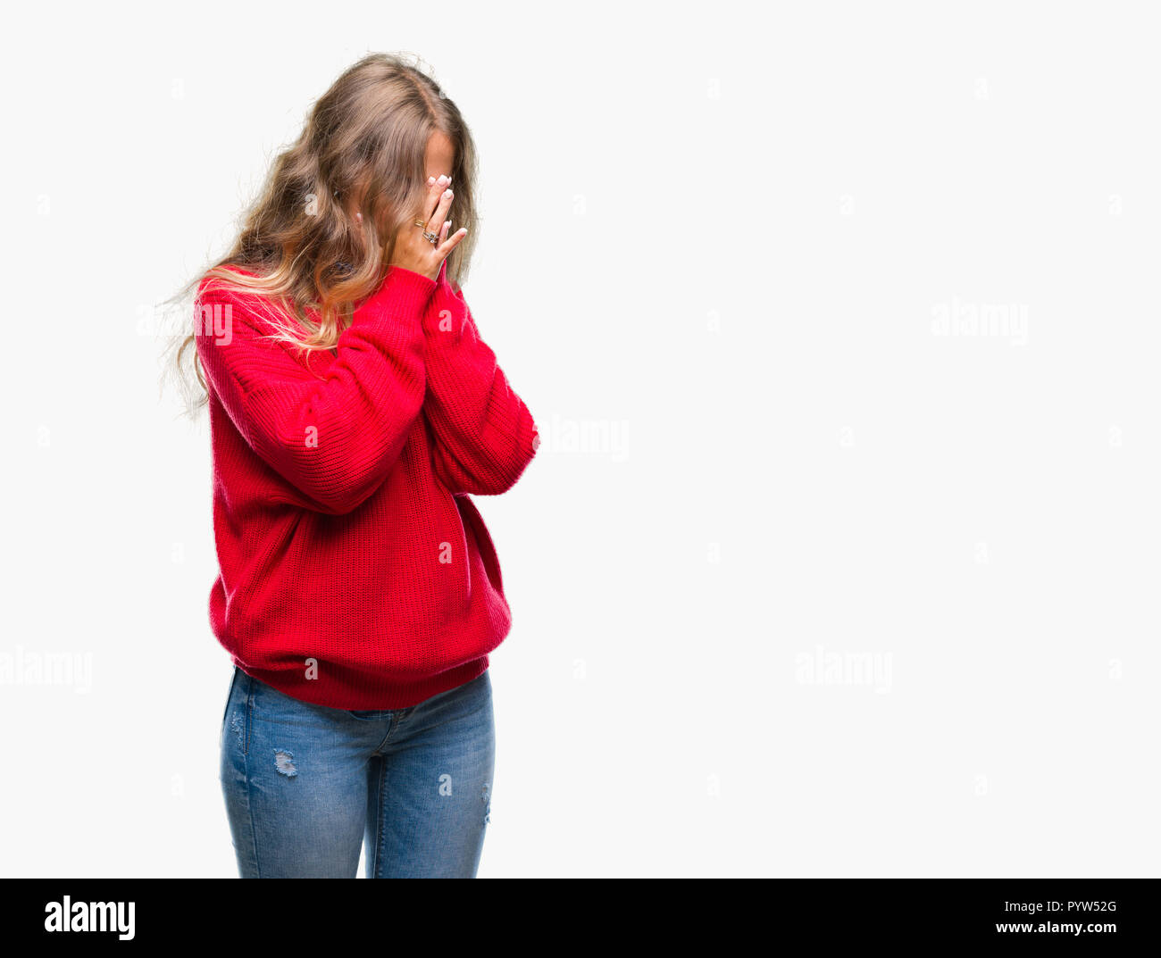 Beautiful young blonde woman wearing winter sweater over isolated ...