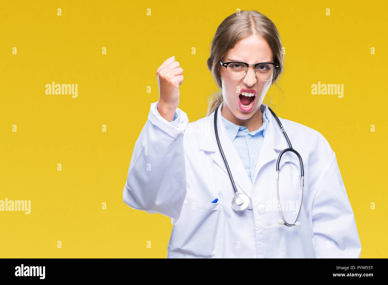 Beautiful young blonde doctor woman wearing medical uniform over ...