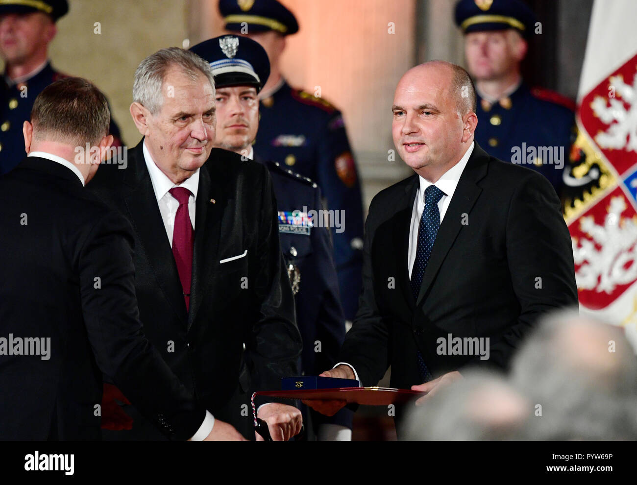 Czech President Milos Zeman, centre, bestowed the Medal of Merit on ...