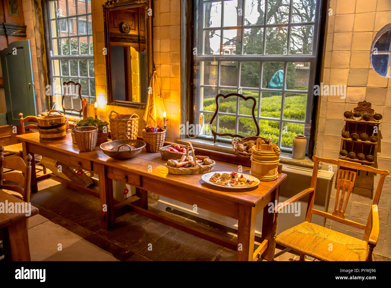 Historic old kitchen in dutch building with pastry and vegetables on ...