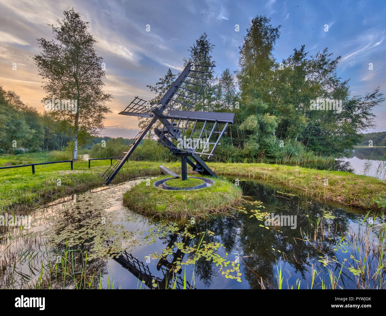 Primitive wooden Tjasker windmill in Friesland Netherlands Stock Photo ...