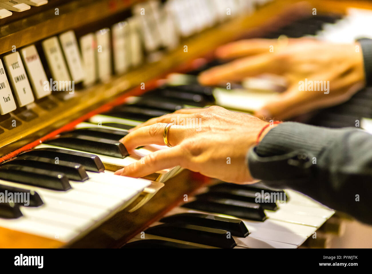 male hands playing organ keyboard in church Stock Photo - Alamy
