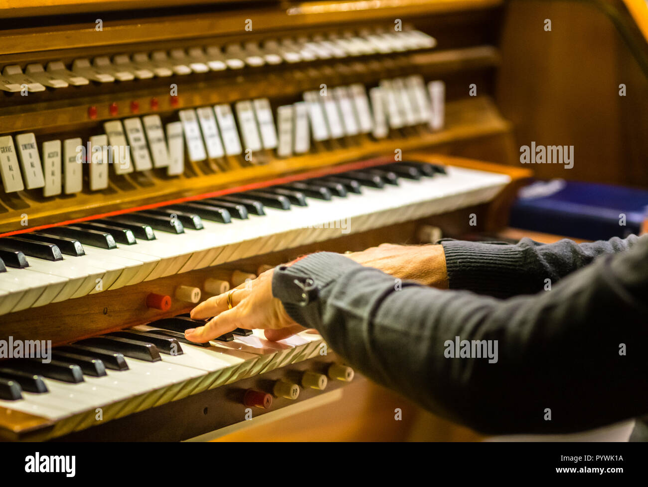 male hands playing organ keyboard in church Stock Photo - Alamy