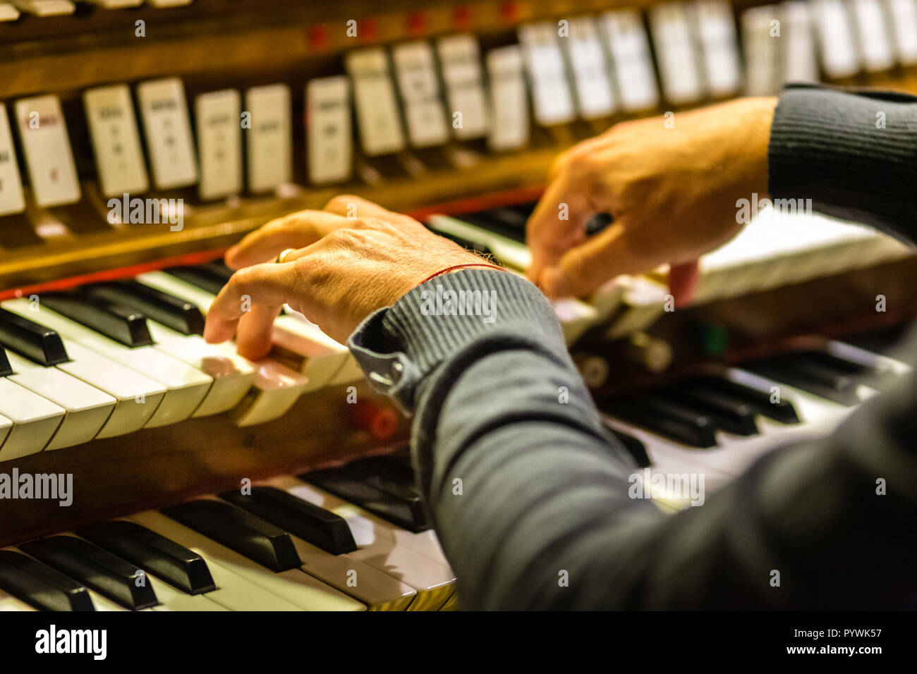 Male organ player hi-res stock photography and images - Alamy