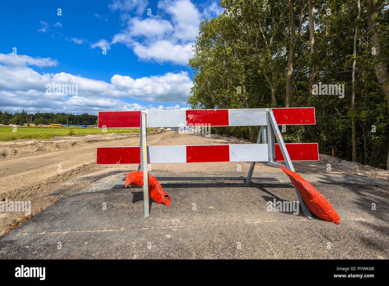 Red and white no entry roadblock on a small asphalt country road Stock ...