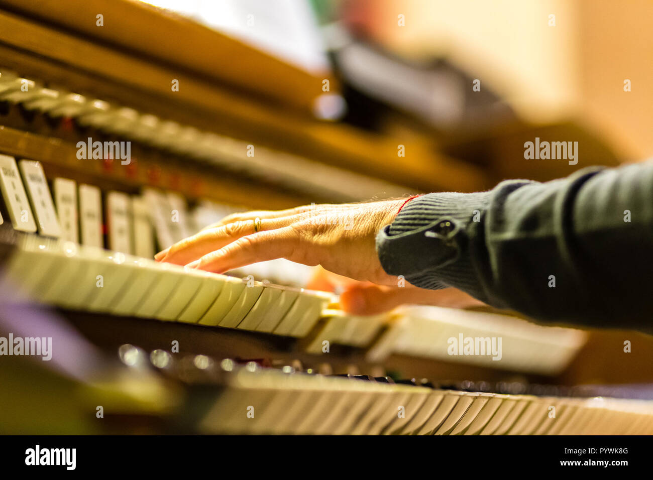 male hands playing organ keyboard in church Stock Photo - Alamy