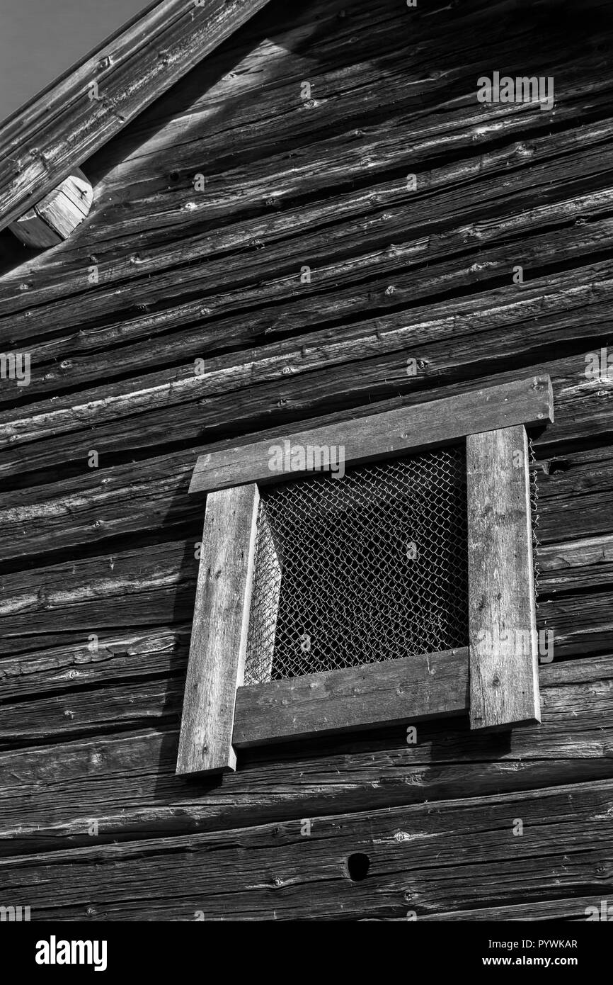 Rustic barn window in an old Swedish farm in northern Sweden Stock ...