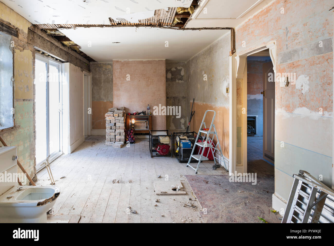 Home DIY renovation gutted empty house interior bare walls Stock Photo ...