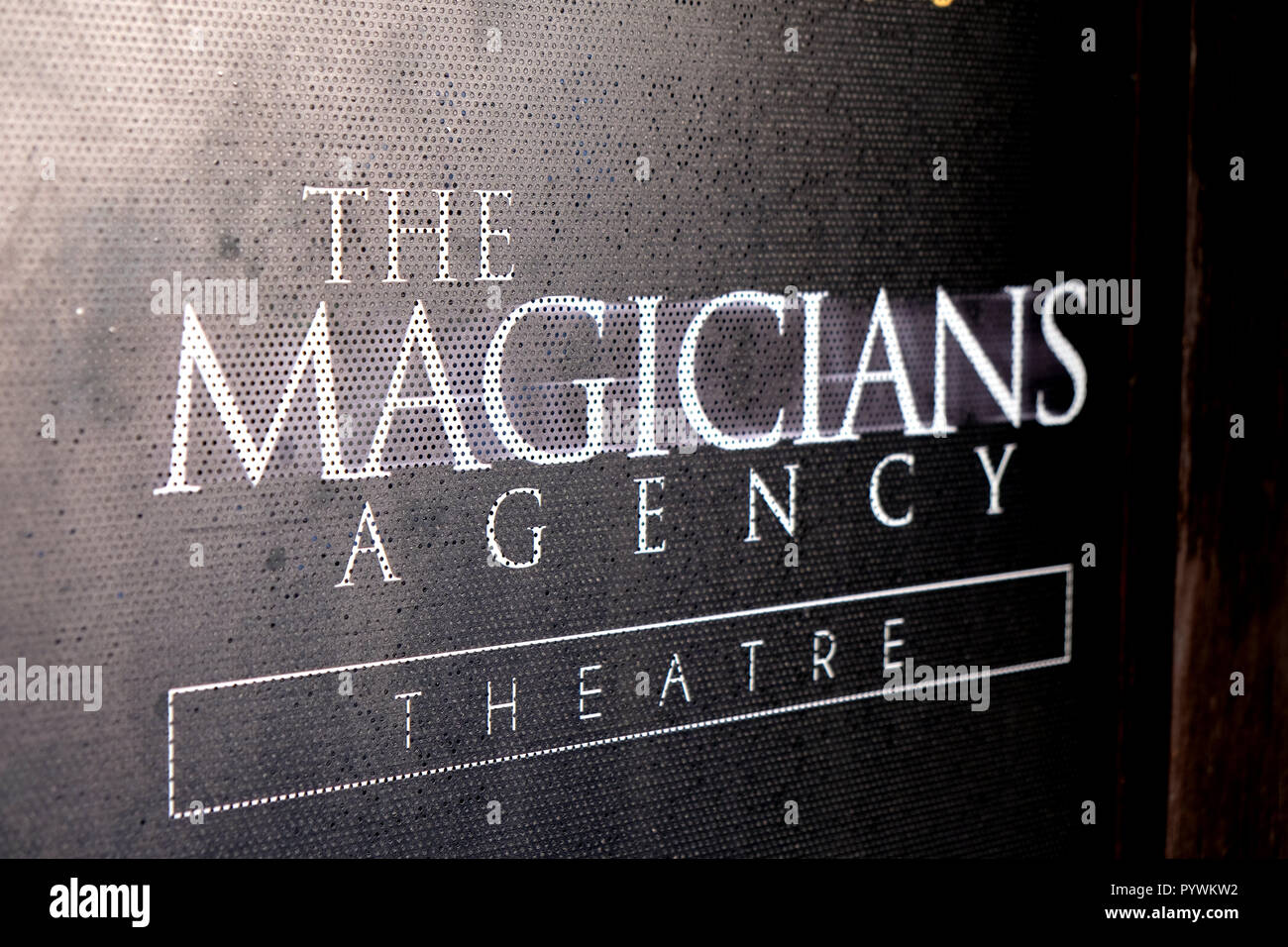 The Magicians Agency Theater sign on a door in downtown San Antonio, Texas, USA Stock Photo - Alamy