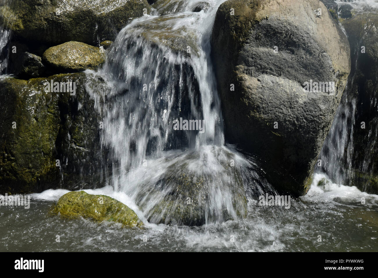 Water over river rocks hi-res stock photography and images - Alamy