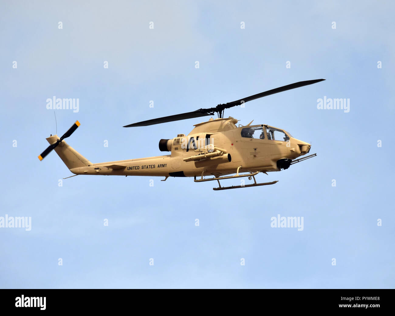 Vietnam War Era US Attack Helicopter In Flight Side View Stock Photo Vietnam War Era US Attack Helicopter In Flight Side View Stock Photo