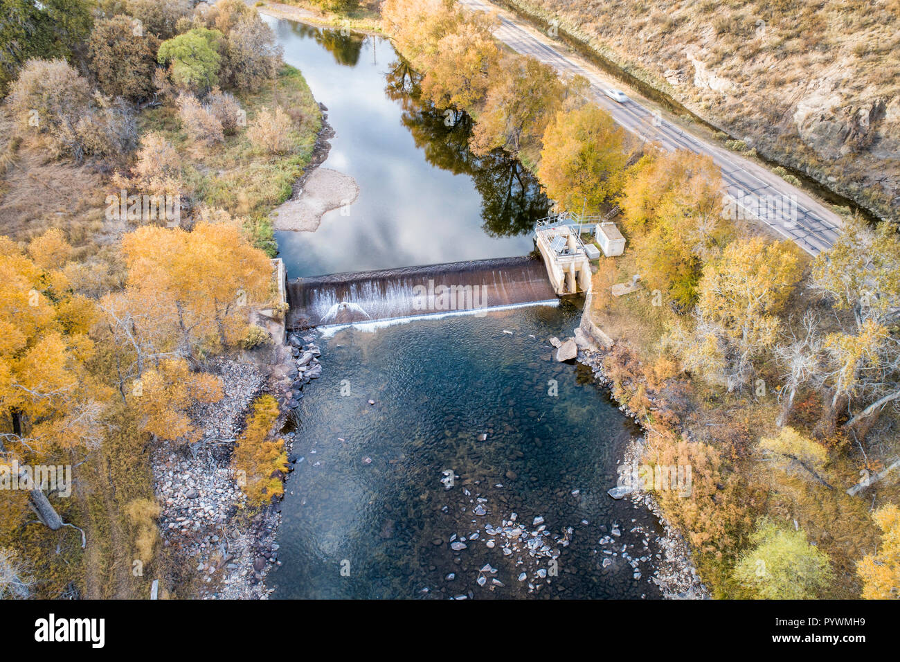 a diversion dam on the Cache la Poudre River at a canyon mouth above ...
