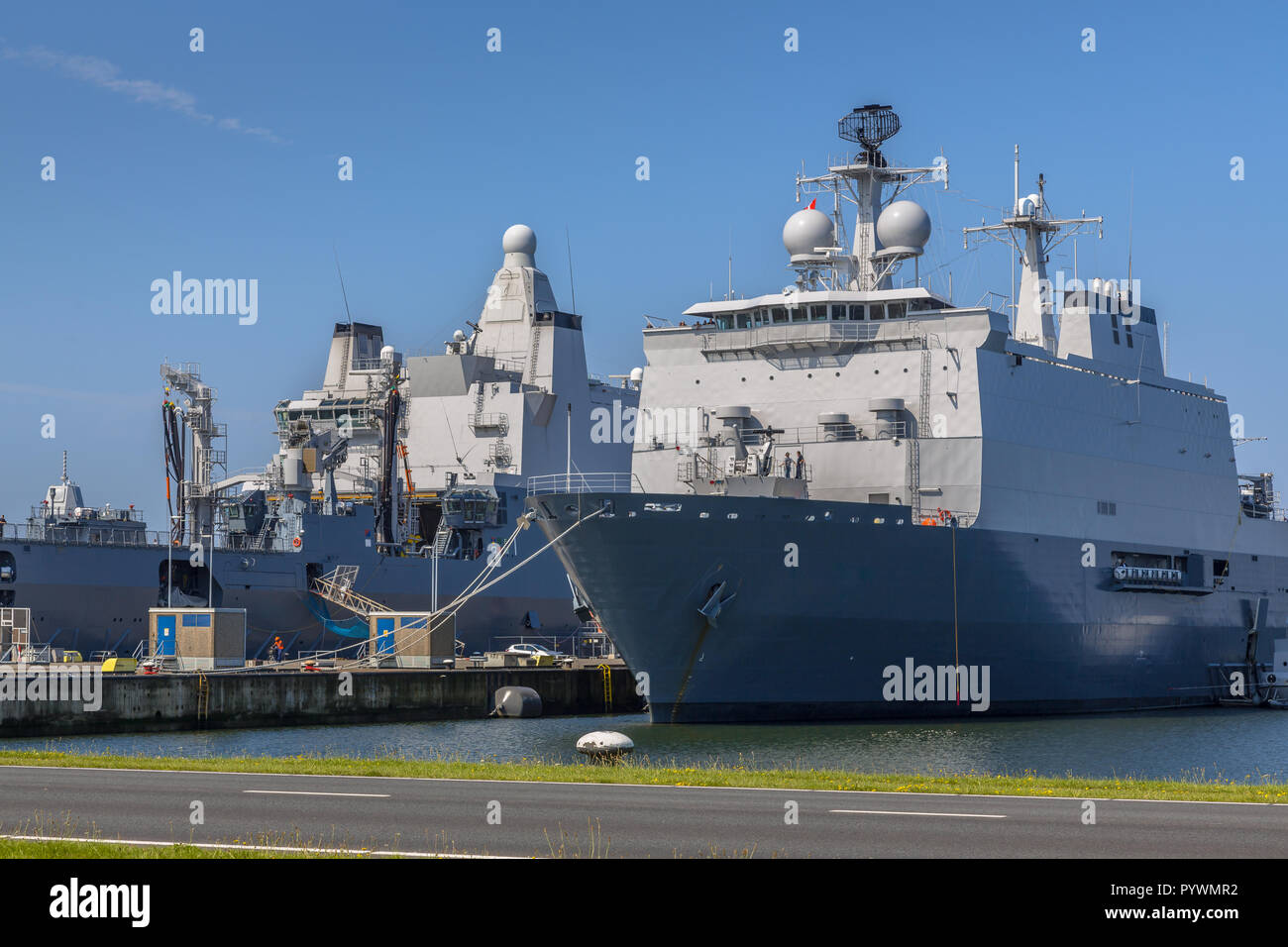 Dutch navy ships in a harbor, loading for their next mission at Den ...