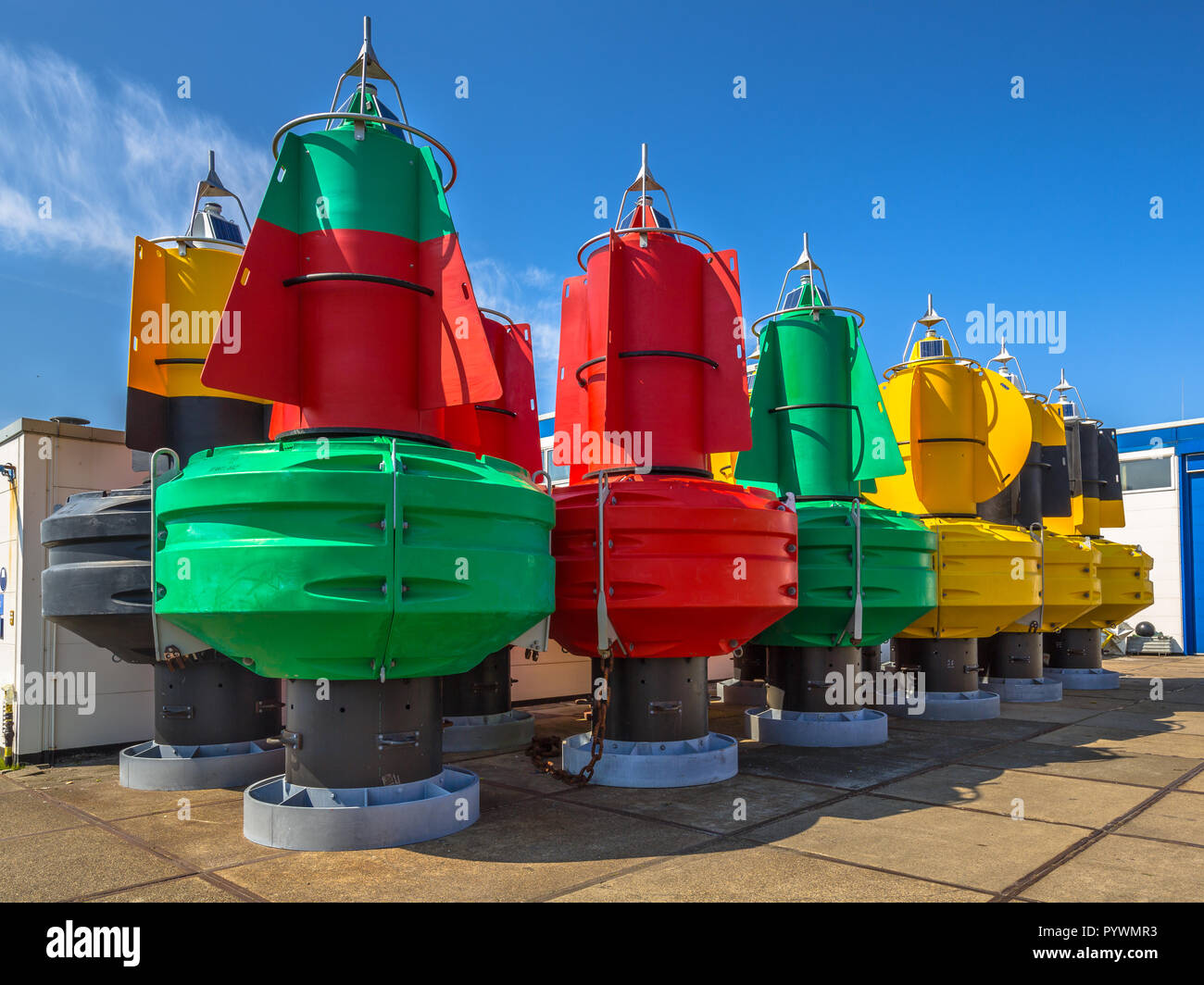 Colorful Nautical Buoys in a storage area. Required to maintain ...