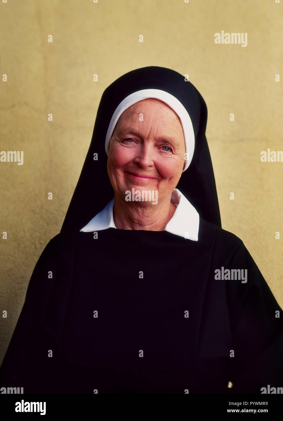 An old nun smiles lovingly Stock Photo - Alamy