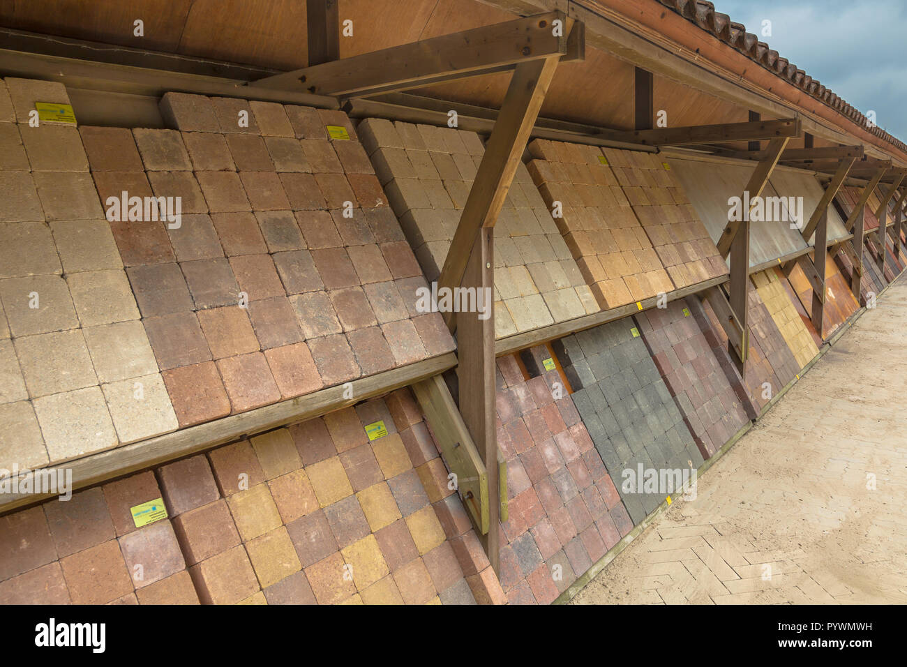 Display of graceful paving stones and road bricks at a stone yard shop ...